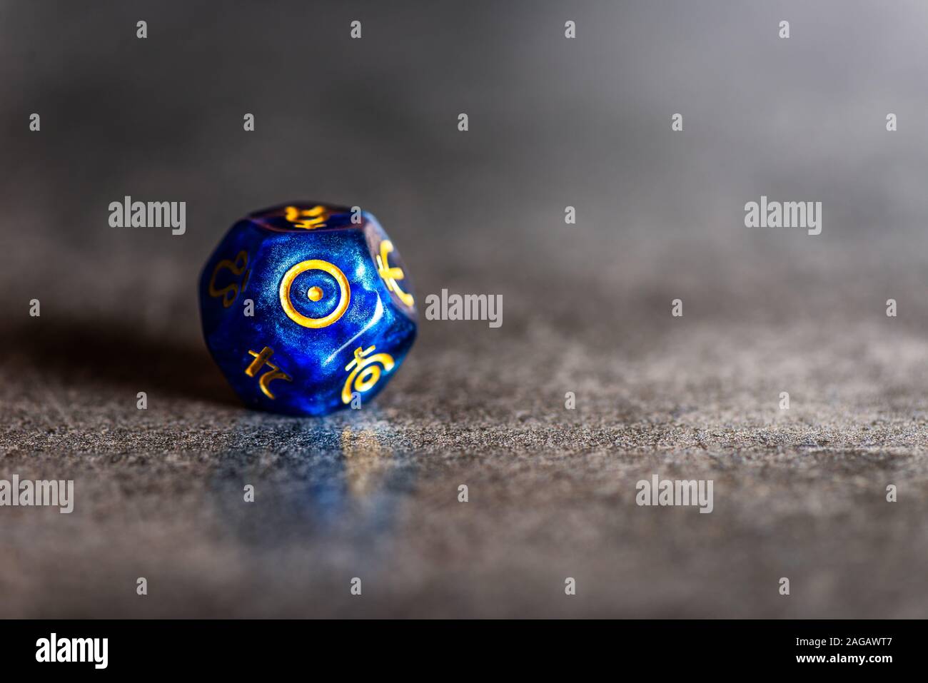 Blue Astrology Dice with symbol of the Sun on grey background Stock ...