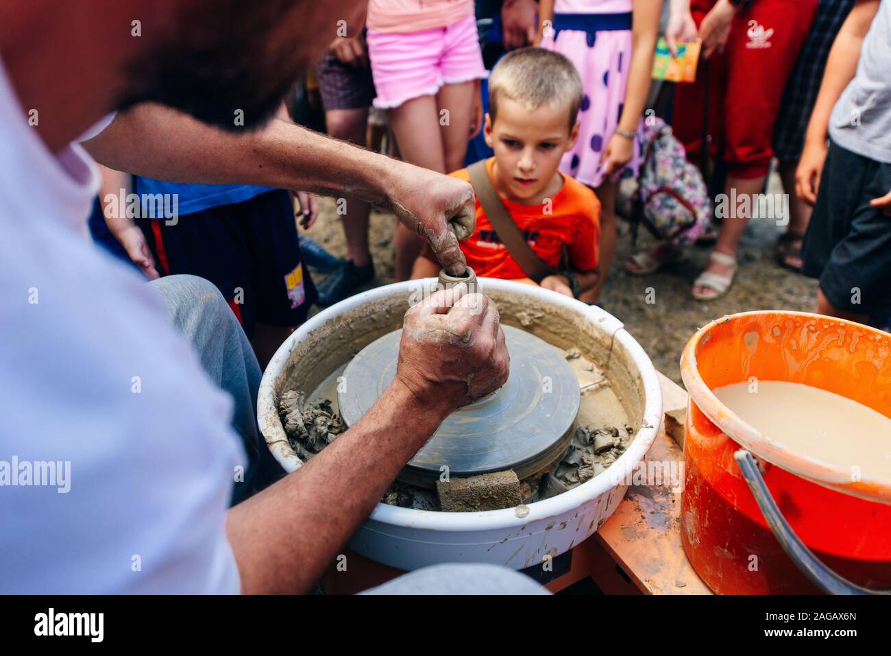 russia - june, 2019 Pottery workshop for kids. Children learning how to ...