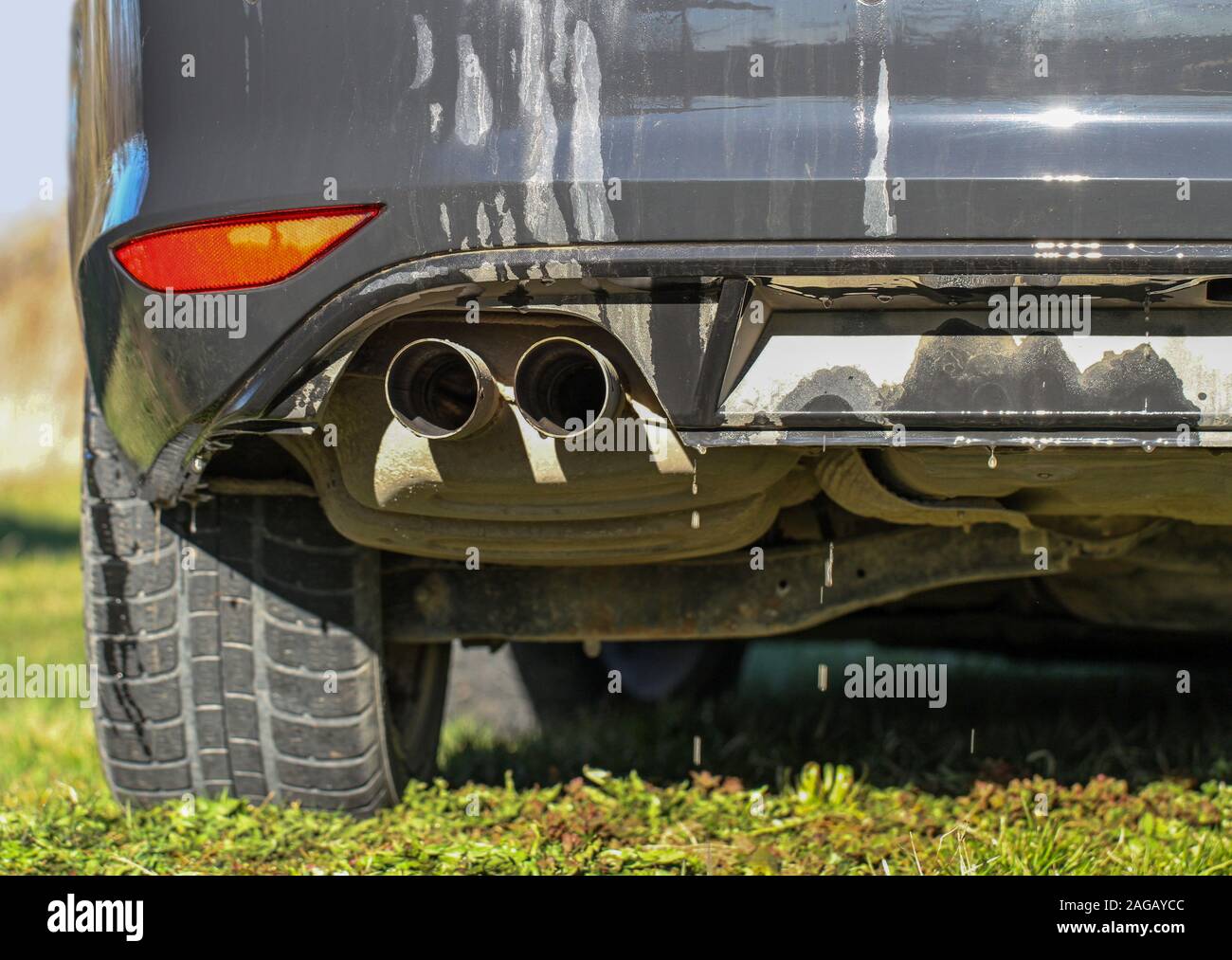 Dirty car in dust, view to the back of window Stock Photo - Alamy