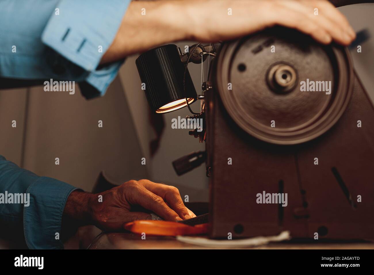 Male tailor working sewing machine hi-res stock photography and images ...