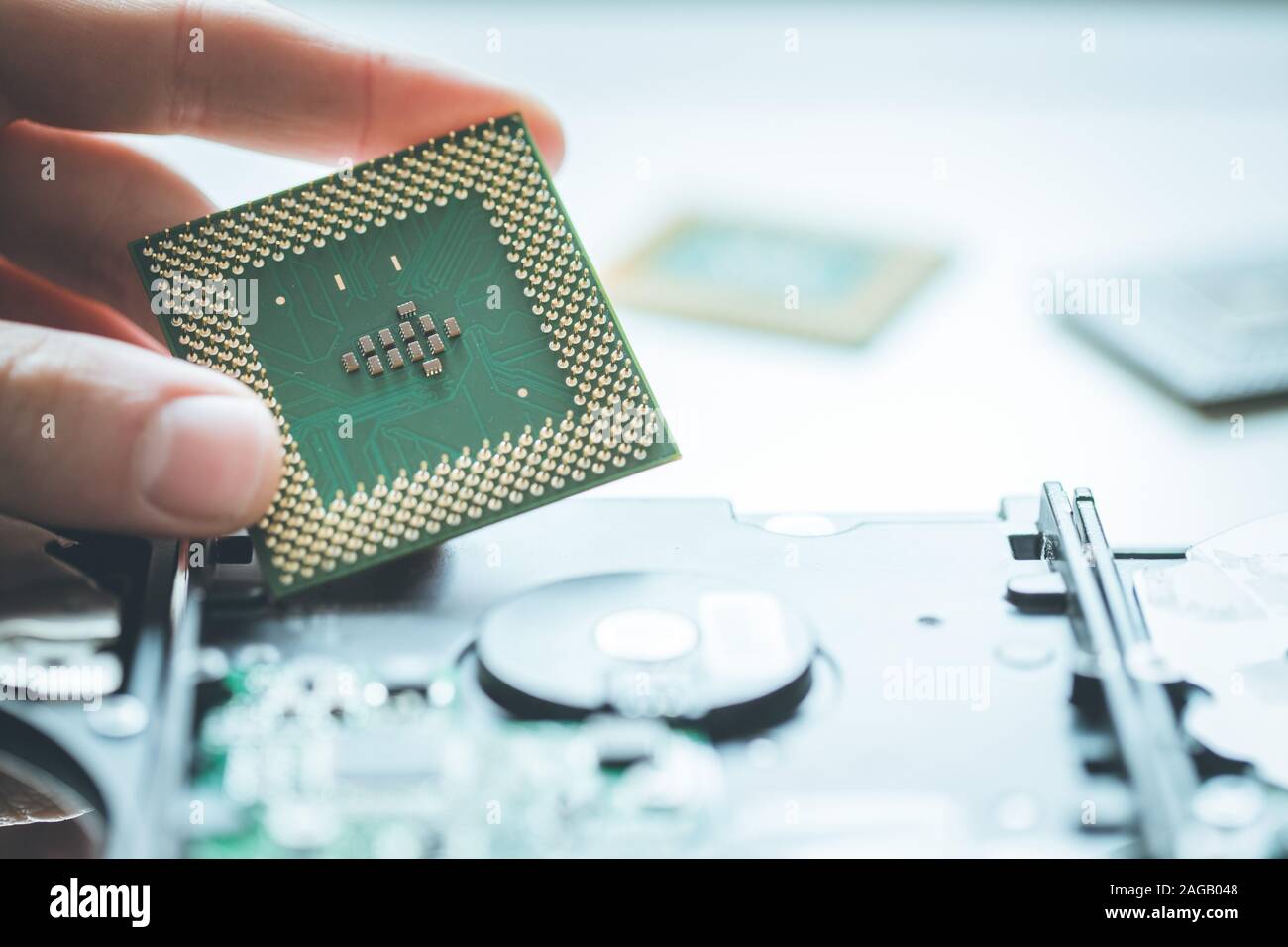 Male hand is holding a cpu, close up; Computer technology Stock Photo ...