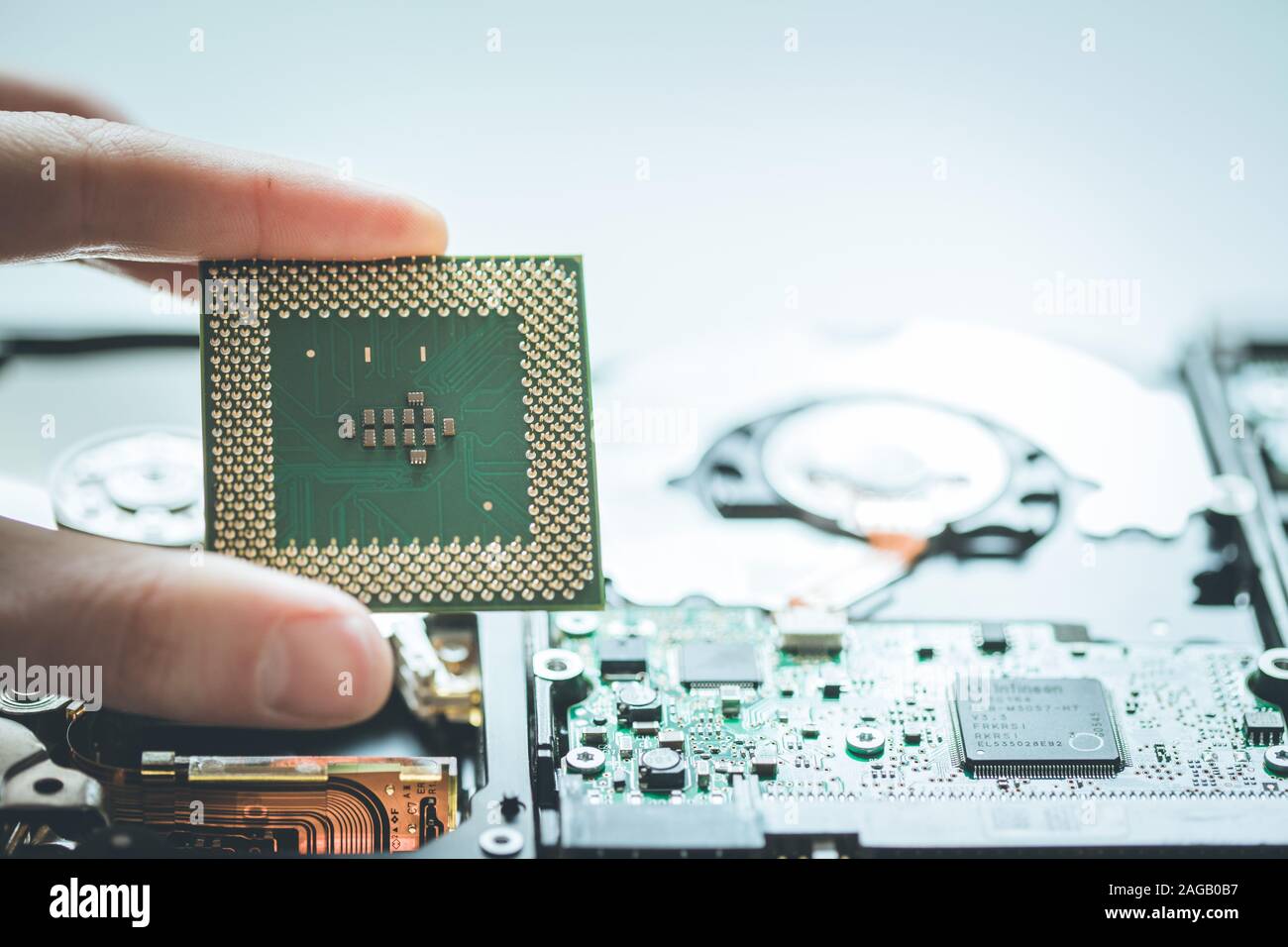 Male hand is holding a cpu, close up; Computer technology Stock Photo ...
