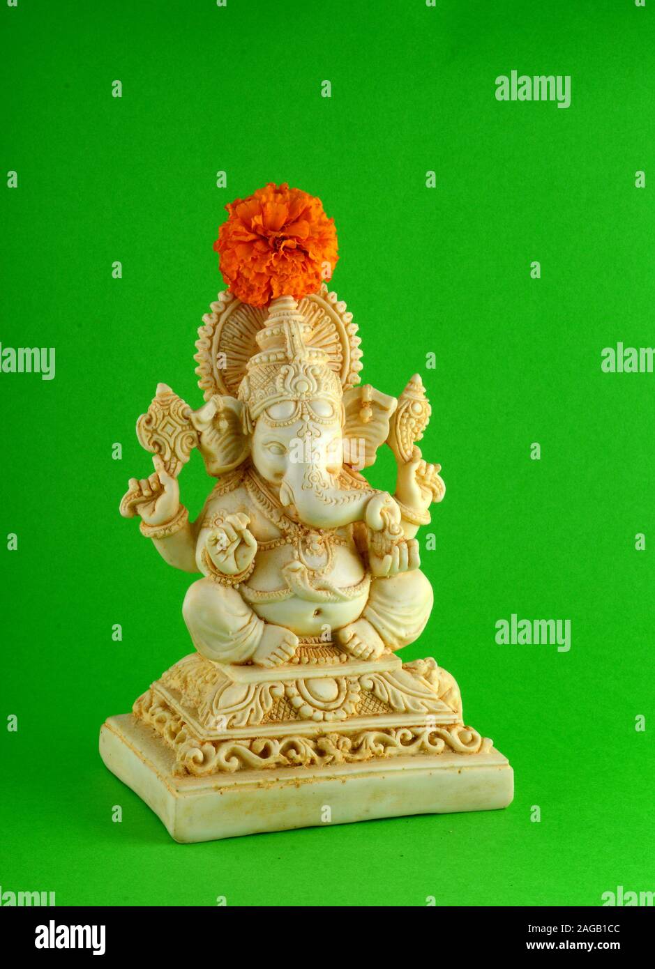 Hindu God Ganesha. Ganesha Idol on green background Stock Photo - Alamy