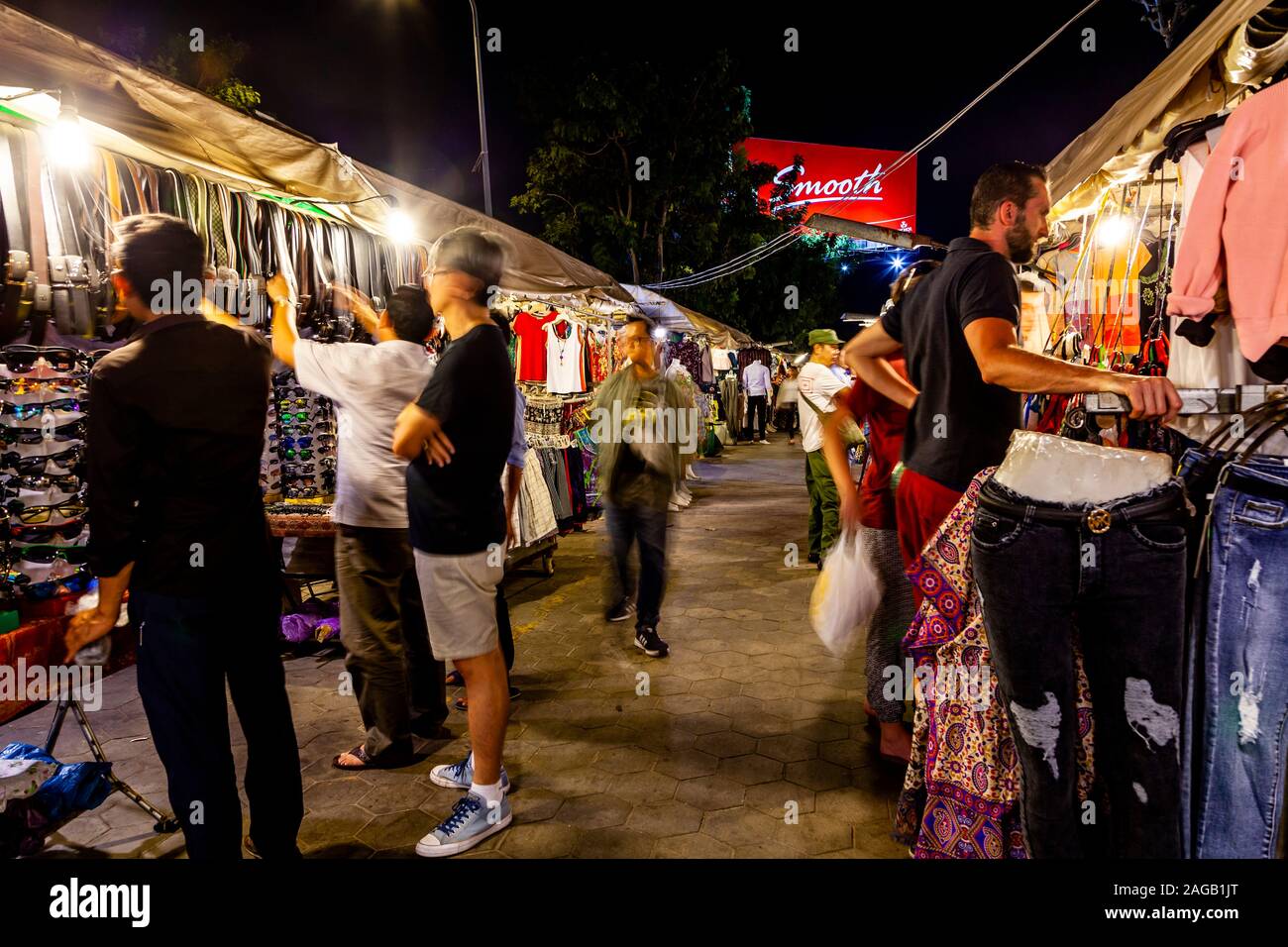 Tourists Looking At Clothing Stalls At The Phnom Penh Night Market ...