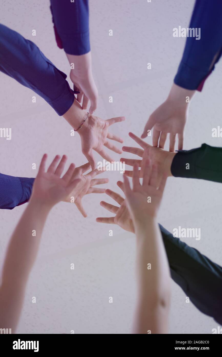 College Students Teamwork Stacking Hand Concept. Close up of young ...