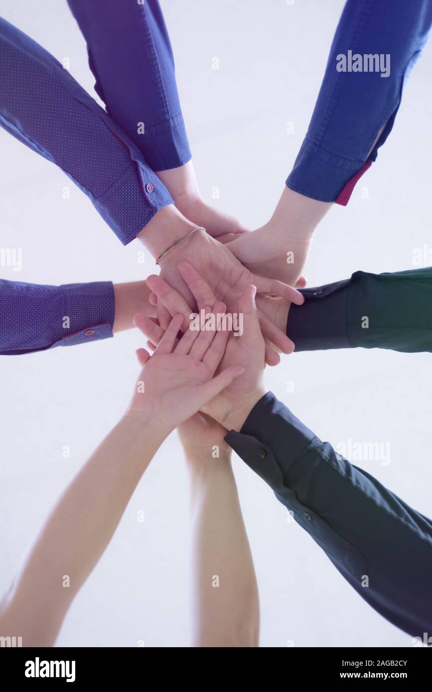 College Students Teamwork Stacking Hand Concept. Close up of young ...