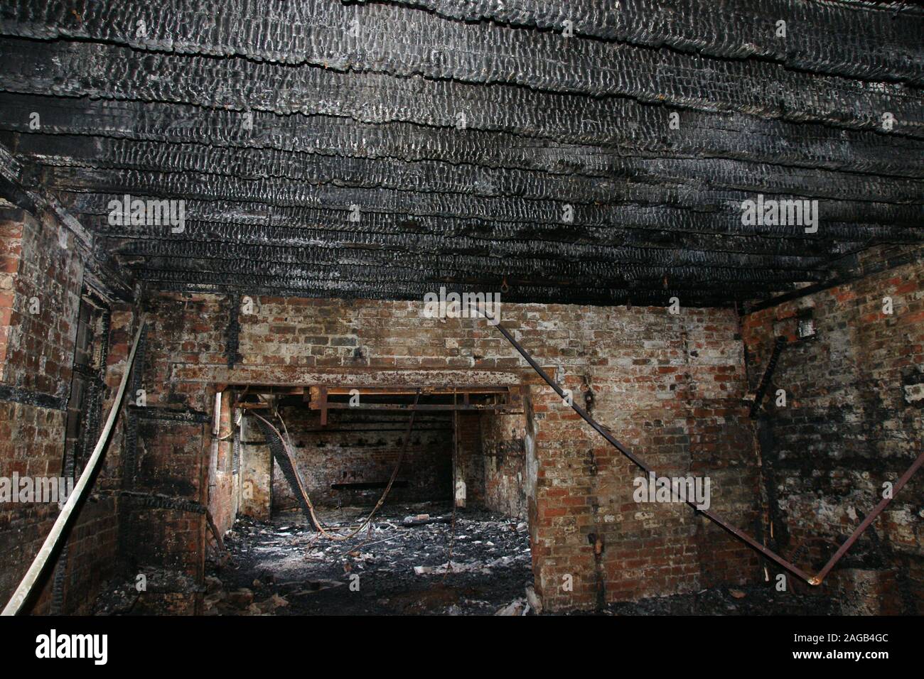 building destroyed by fire Stock Photo - Alamy