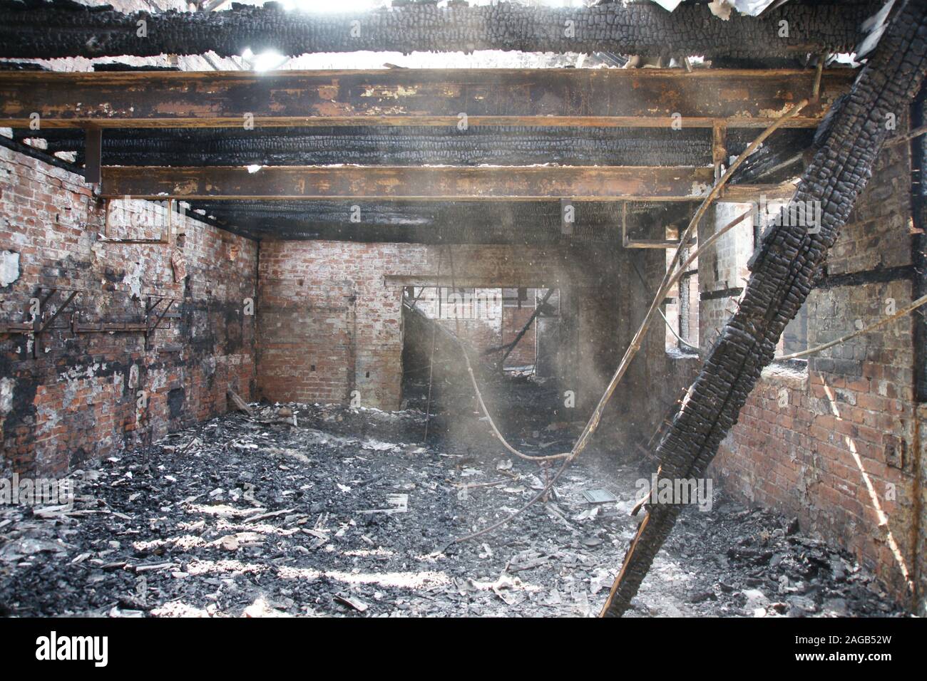 building destroyed by fire Stock Photo - Alamy