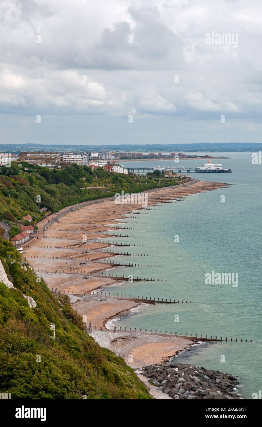 Elevated views of Eastbourne seafront with groynes and pier, East ...