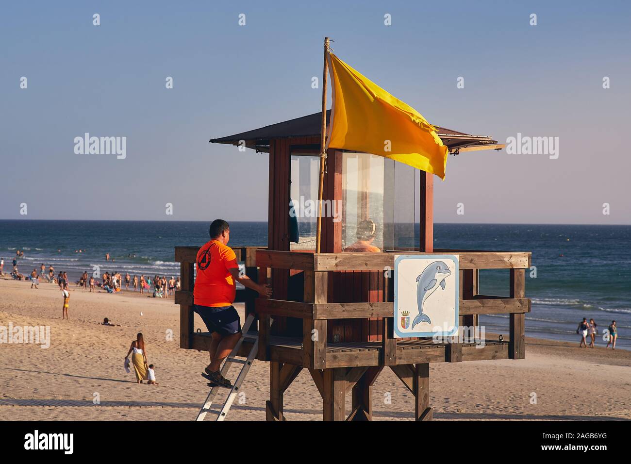 Yellow flag on beach hi-res stock photography and images - Alamy