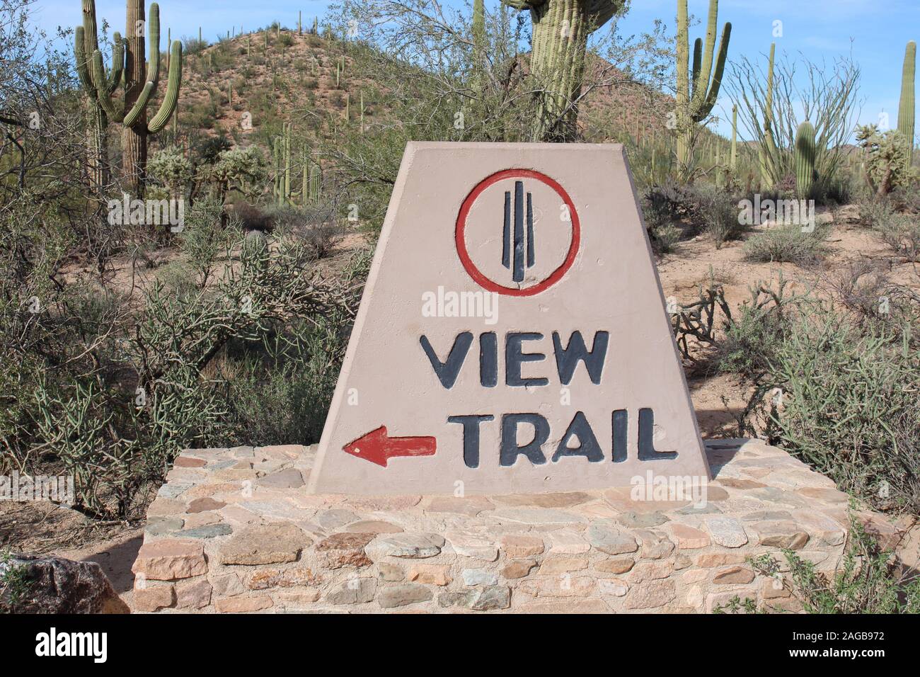 The trail sign for the Valley View Overlook Trail in front of a desert ...