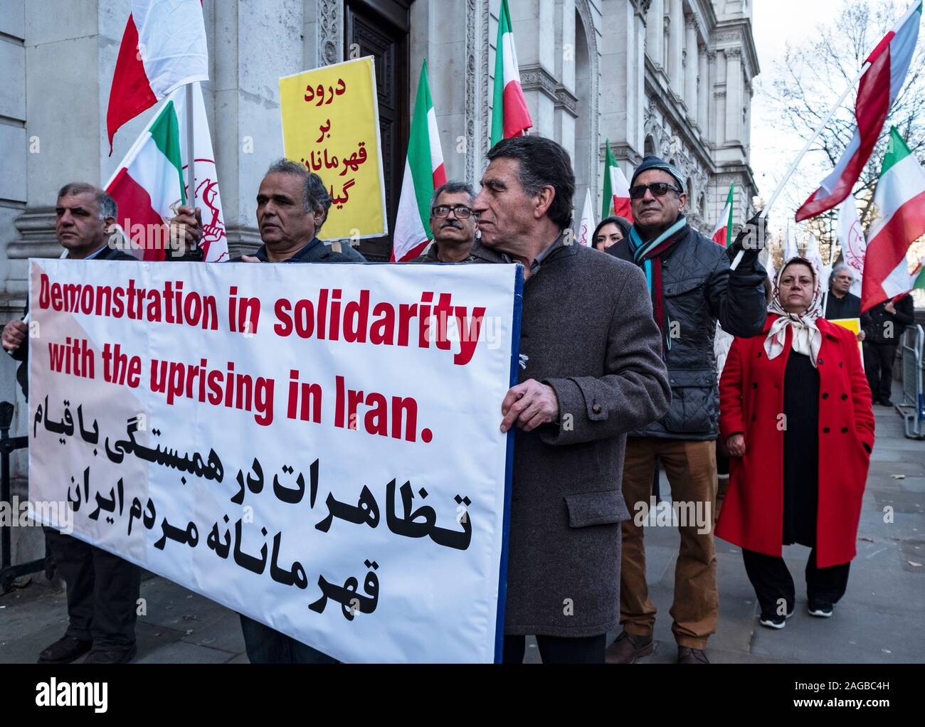 Iranians protest in London in sympathy with and supporting the ...