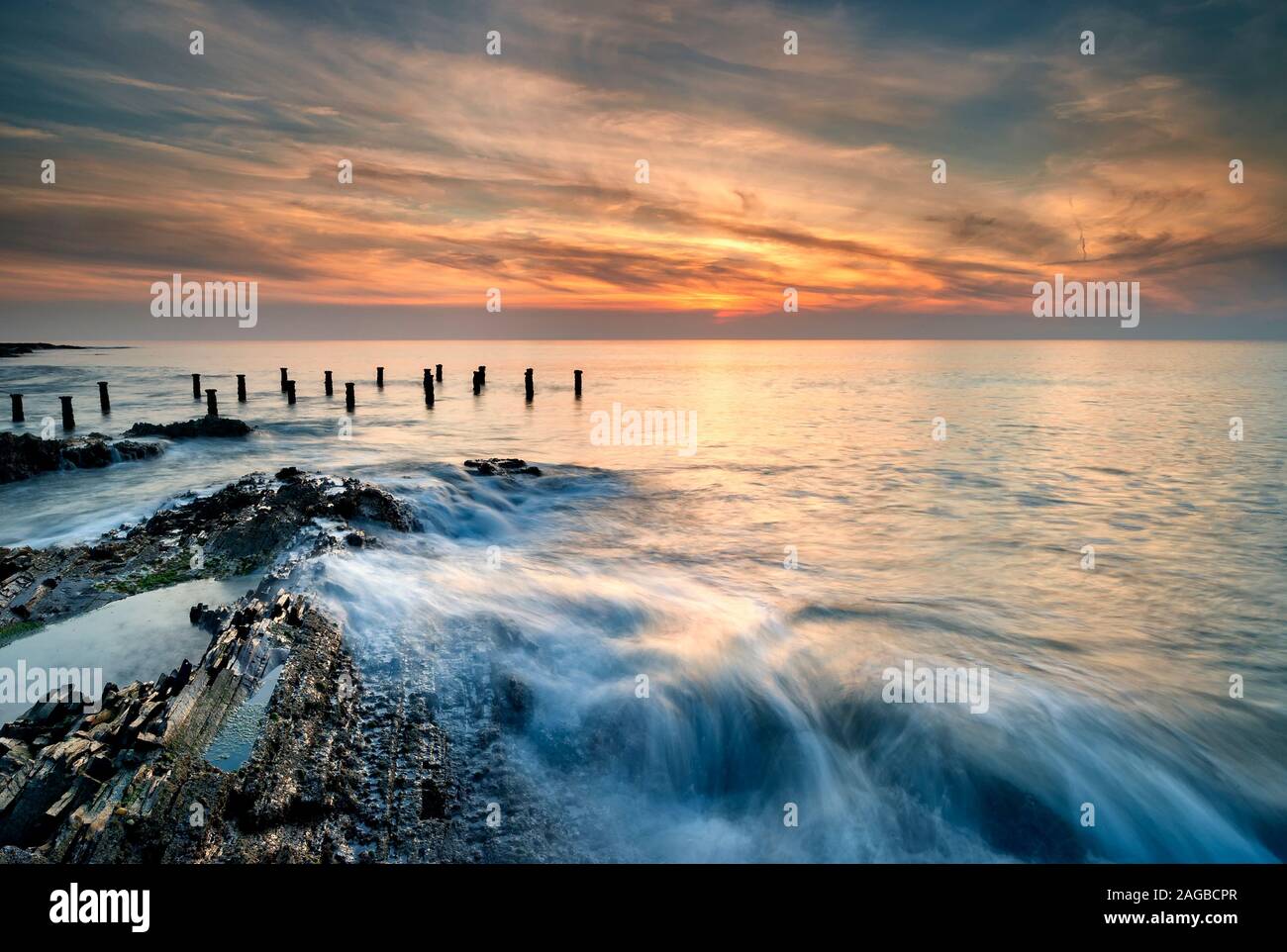 Old pier at sunset hi-res stock photography and images - Alamy