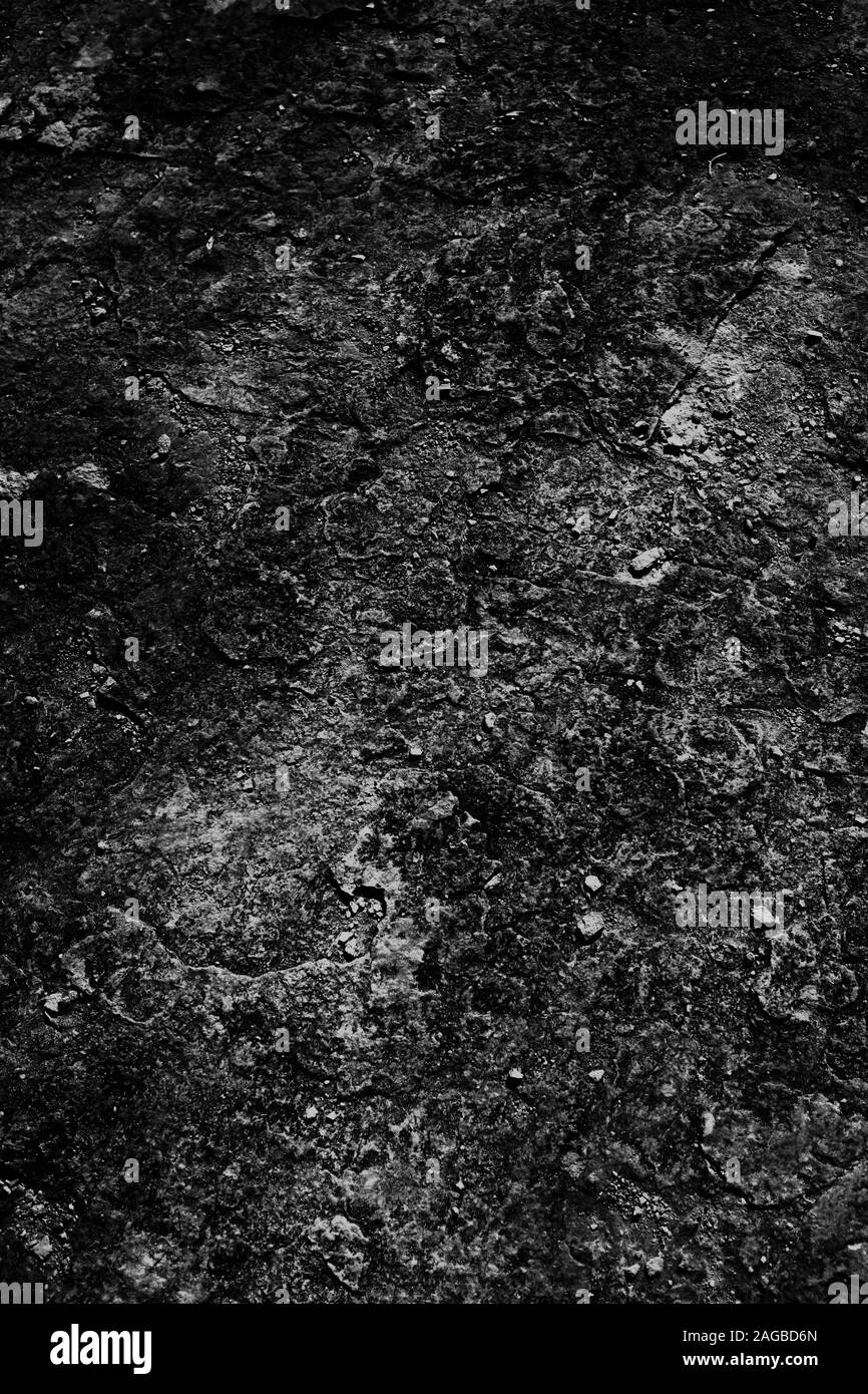 Vertical greyscale shot of a ground covered with a lot of stones Stock ...