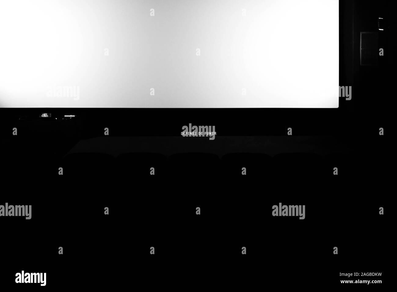 Bright white led screen with the sign "defense de fumer" translation ...