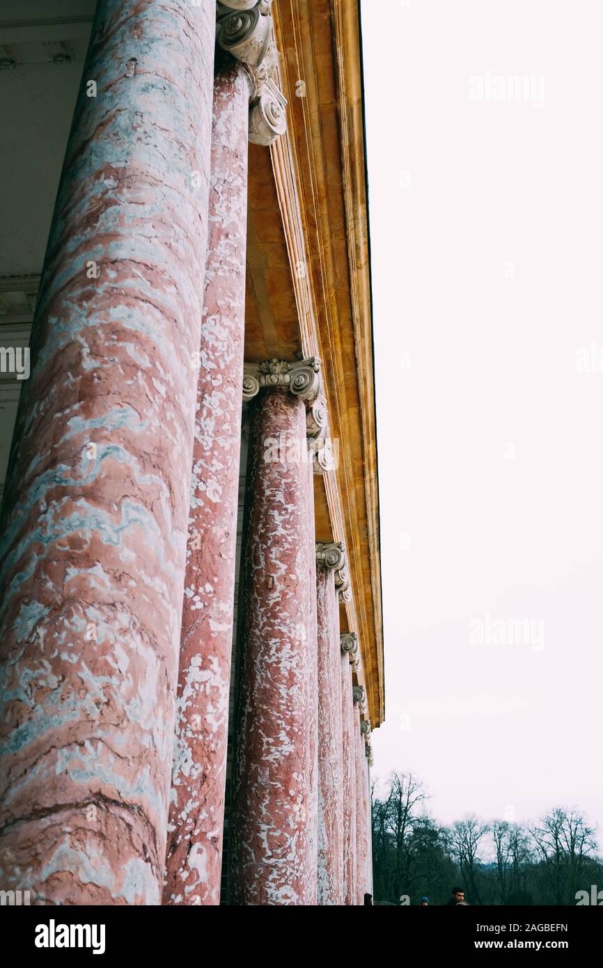 Vertical low angle shot of the beautiful stone columns of an old building Stock Photo - Alamy