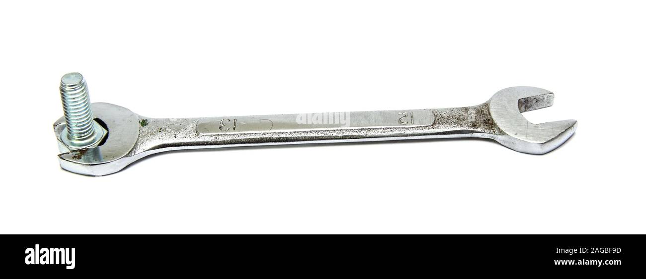 Wrench and bolt isolated on a white background Stock Photo - Alamy