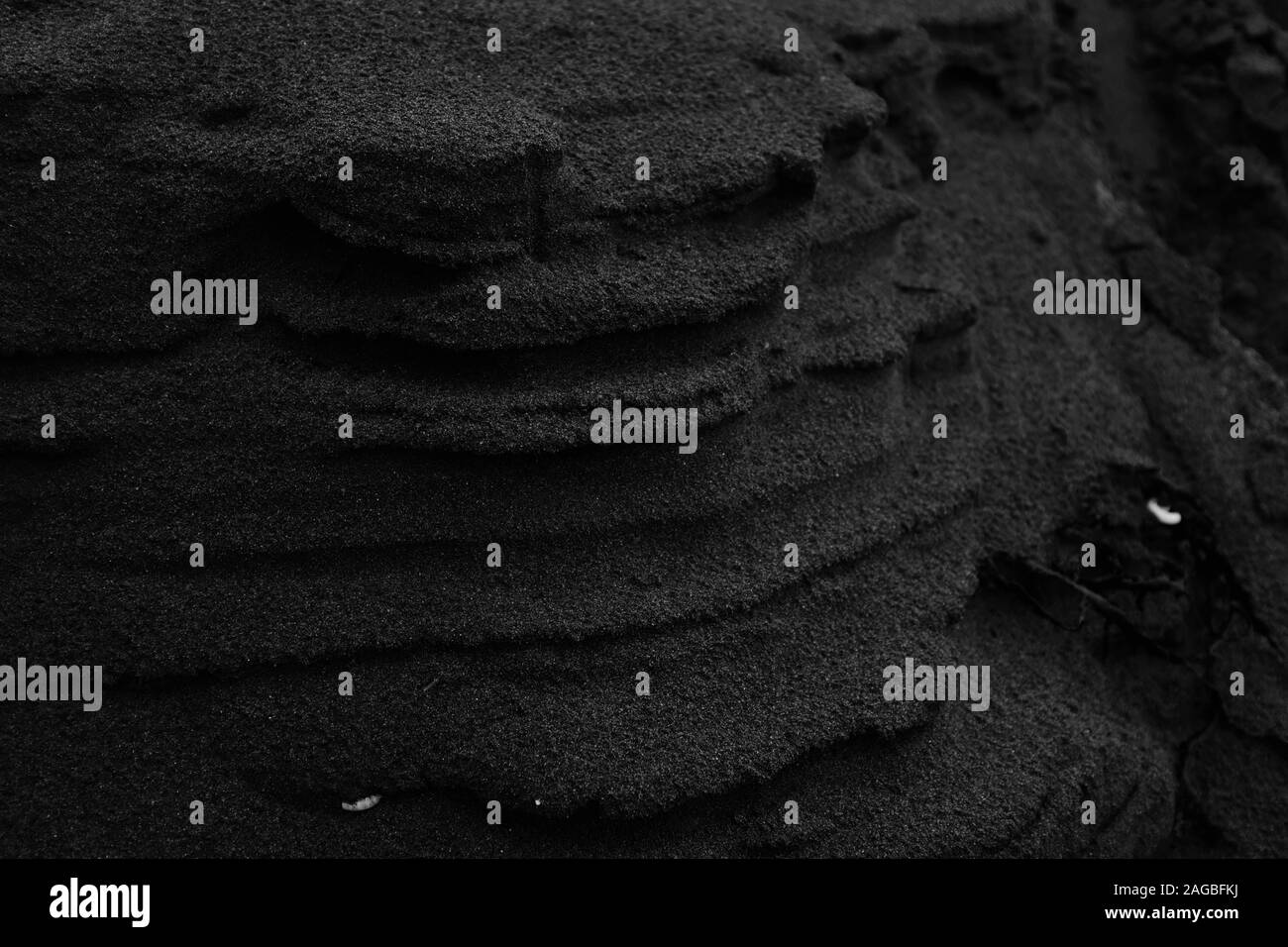Cool greyscale background of black sand with interesting textures Stock ...