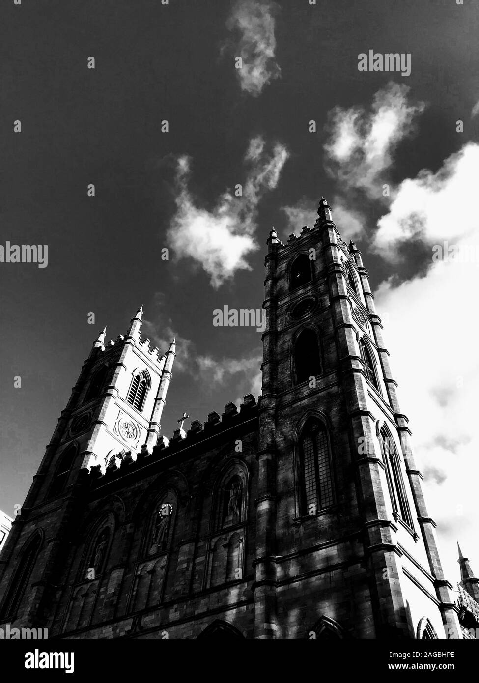 Vertical grey scale shot of an old church in Montreal captured from a ...