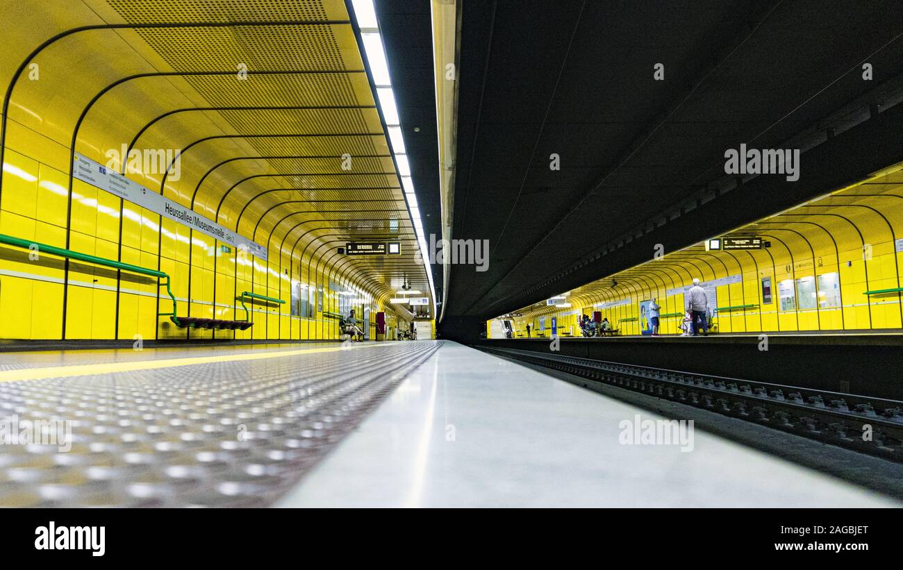 Wide shot of the interior of a subway station with yellow walls Stock ...