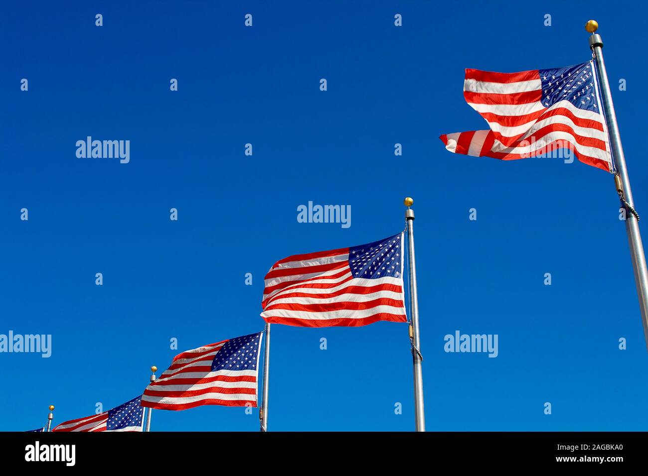 Waving flag deep blue sky hi-res stock photography and images - Alamy