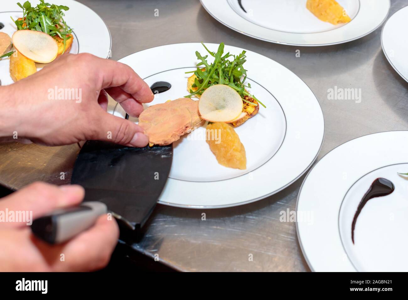 Chef making appetizer fish hi-res stock photography and images - Alamy