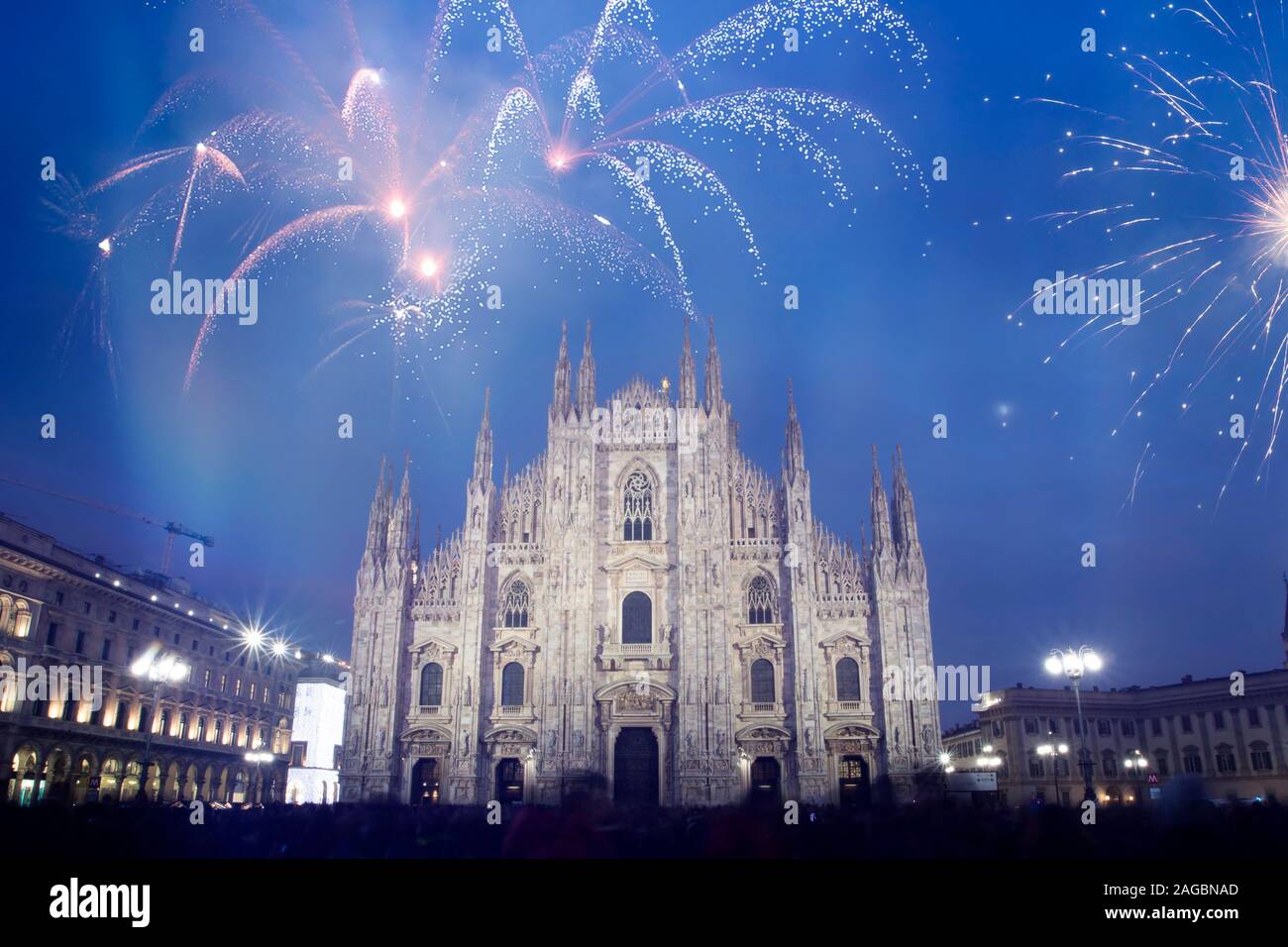 Duomo cathedral with fireworks - celebration of New Year in Milan ...