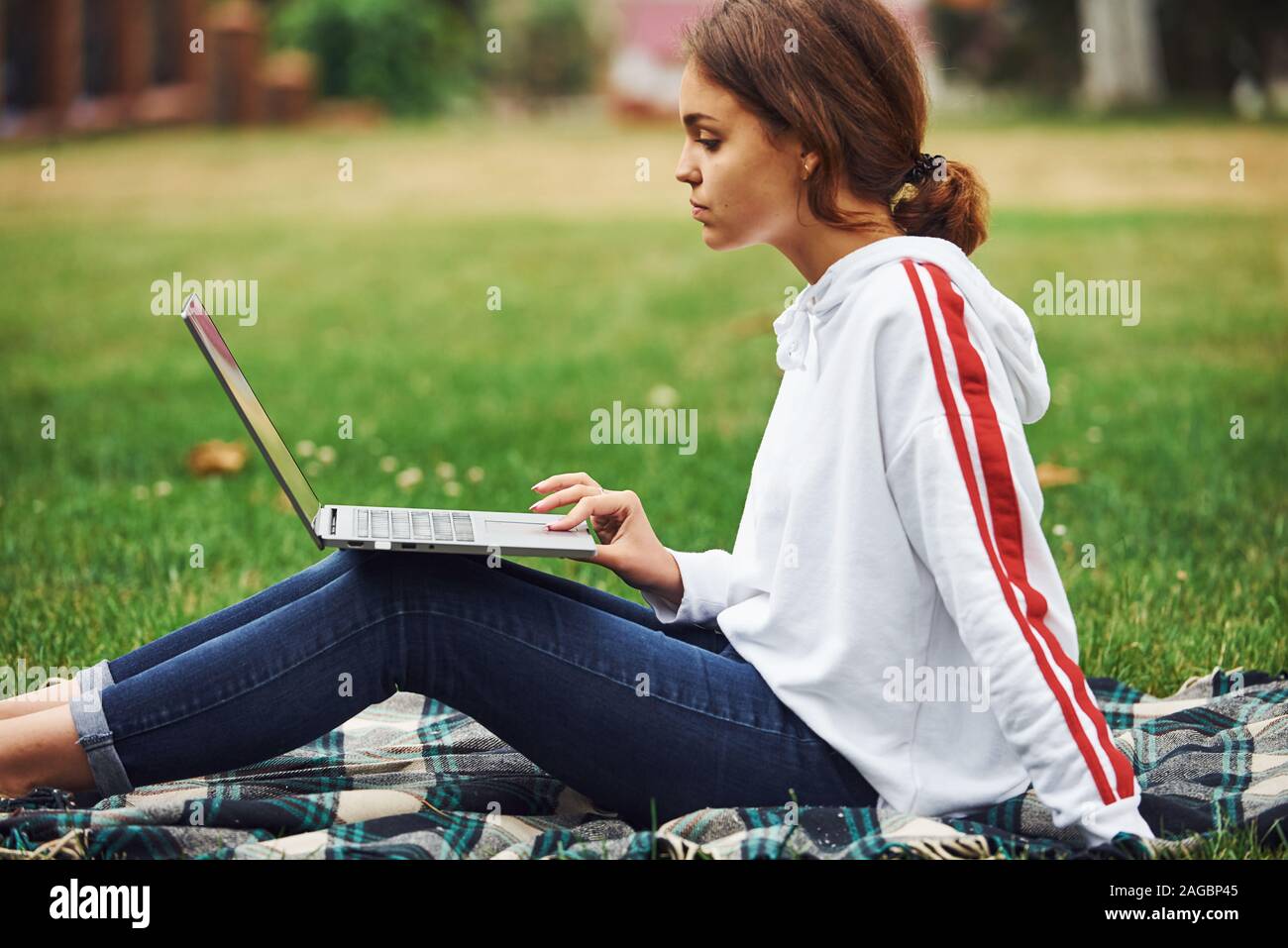 Teen girl lying in field hi-res stock photography and images - Alamy