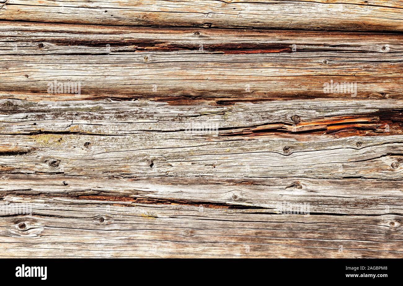 Old rough wooden logs with cracks as background. Wooden rough texture ...