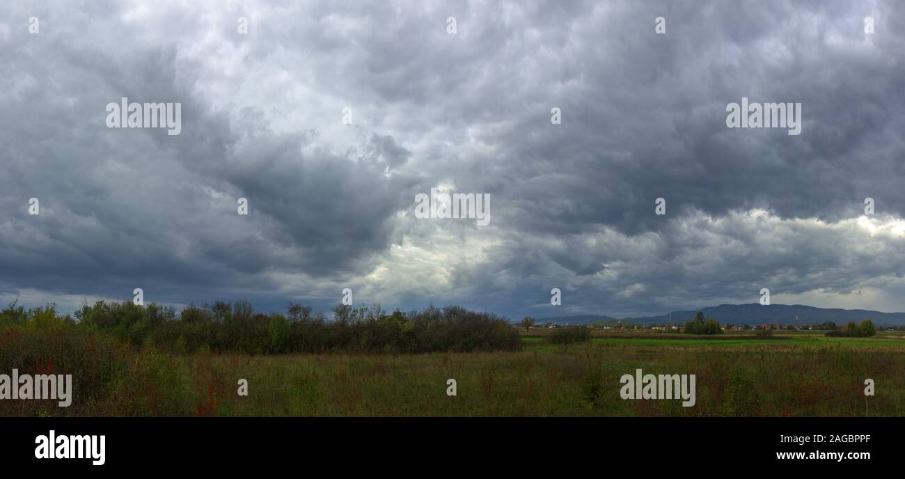 Beautiful scenery of a green landscape under the breathtaking crazy ...