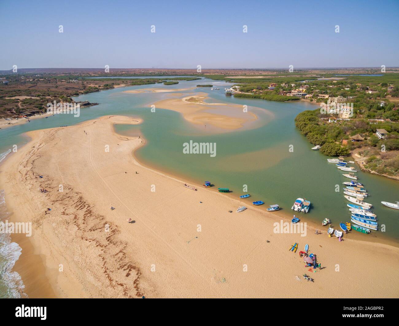 High shot of beaches surrounded by cruise ships and greenery under a ...