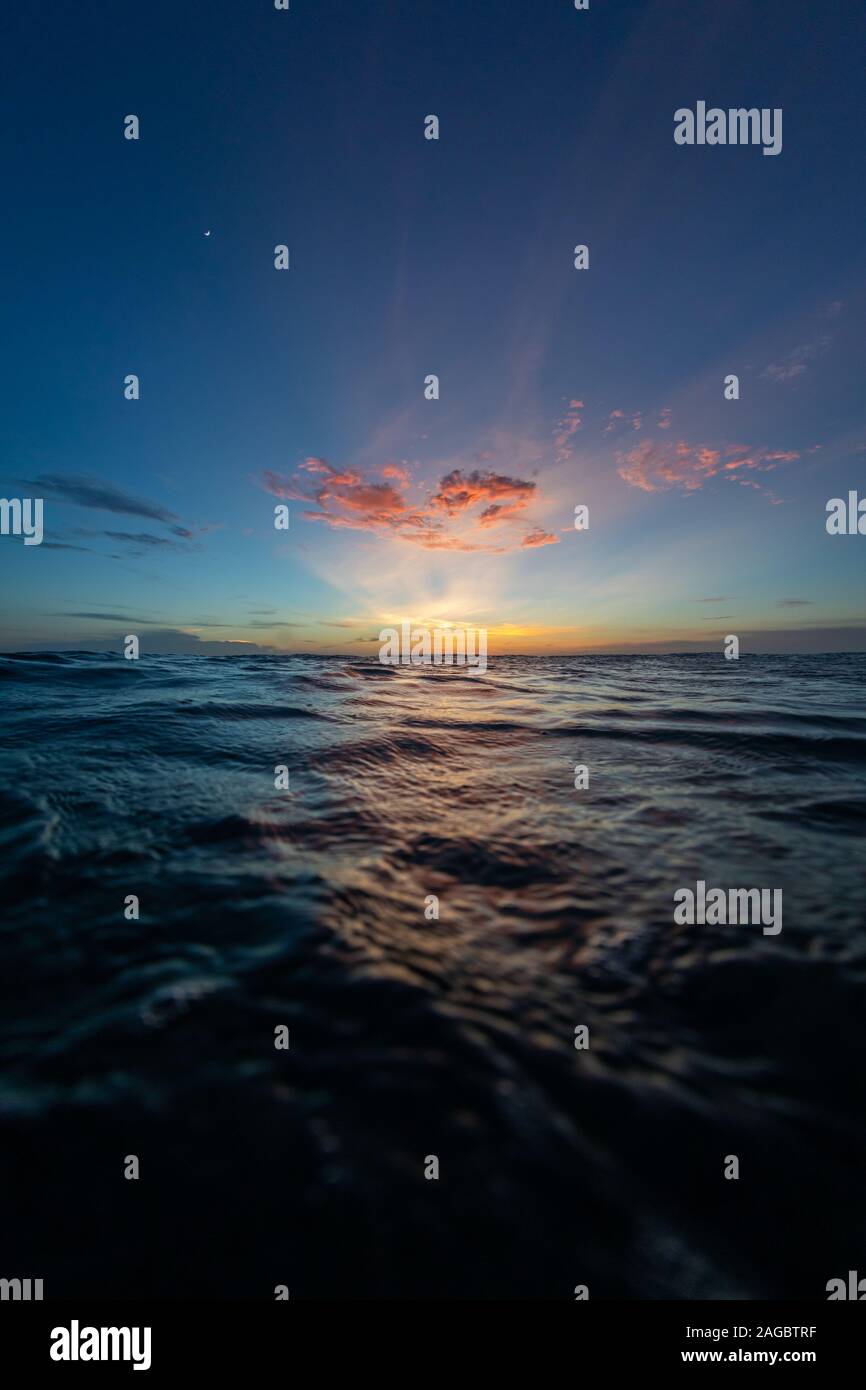 Sunset in the ocean in bonaire island hi-res stock photography and ...