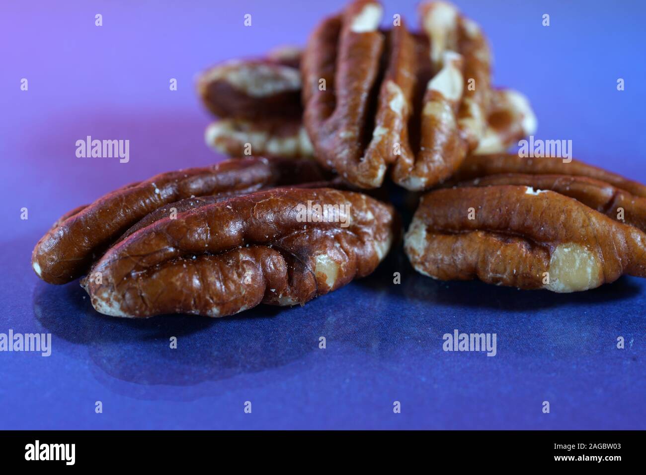The pecan kernels taste similar to the walnut kernels, photographed ...