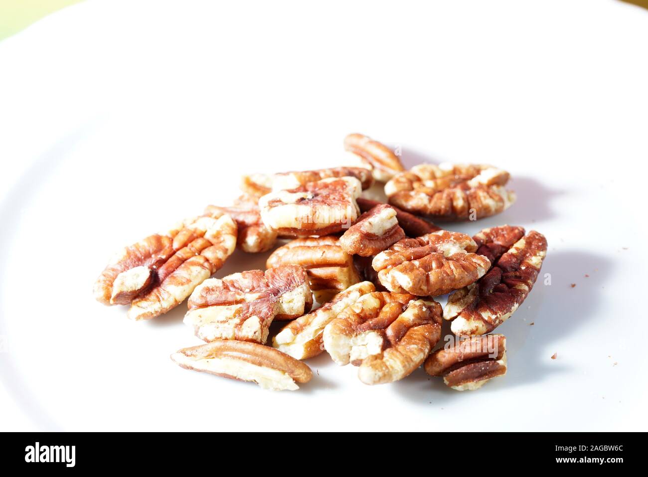 The pecan kernels taste similar to the walnut kernels, photographed ...