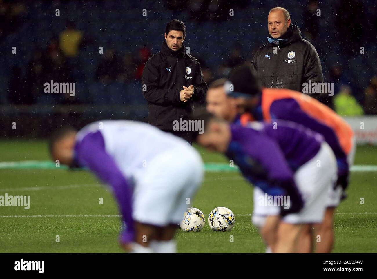 Manchester City assistant manager Mikel Arteta (left) and Rodolfo ...