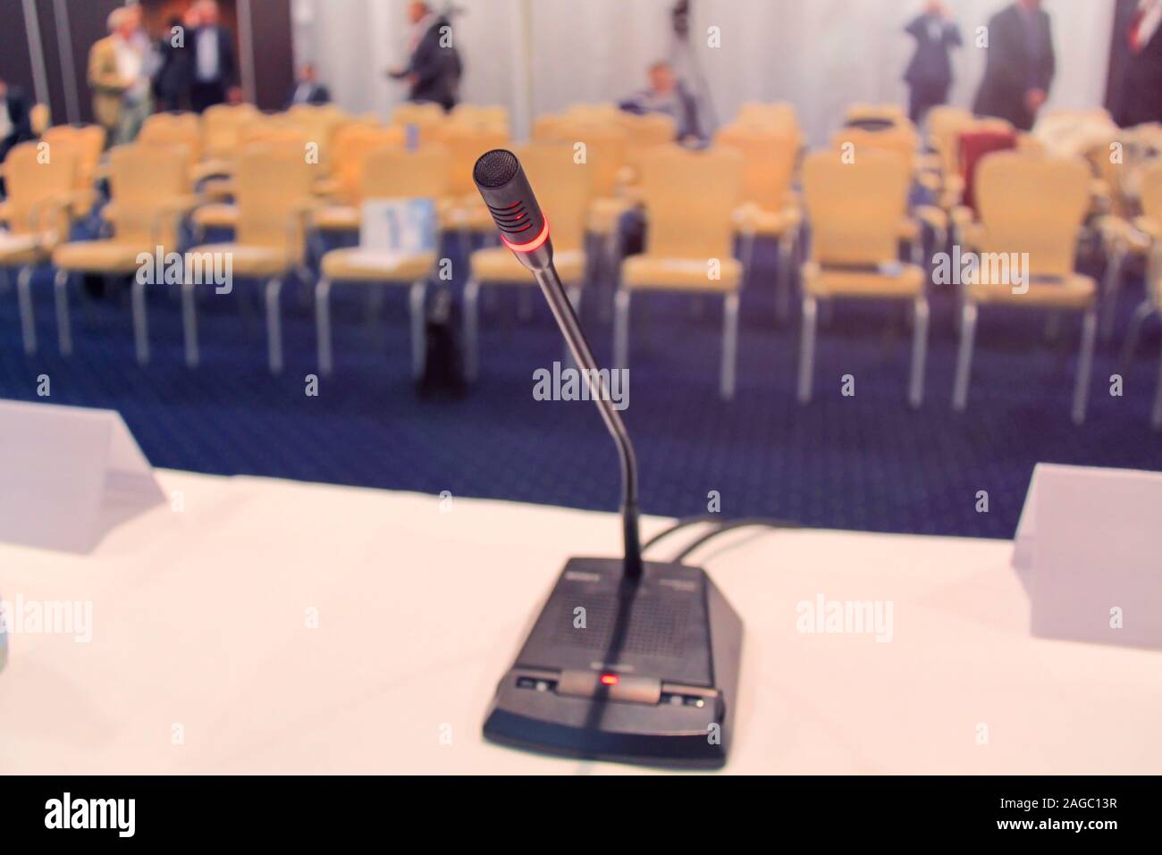 Front view of the microphones during business conference in conference ...