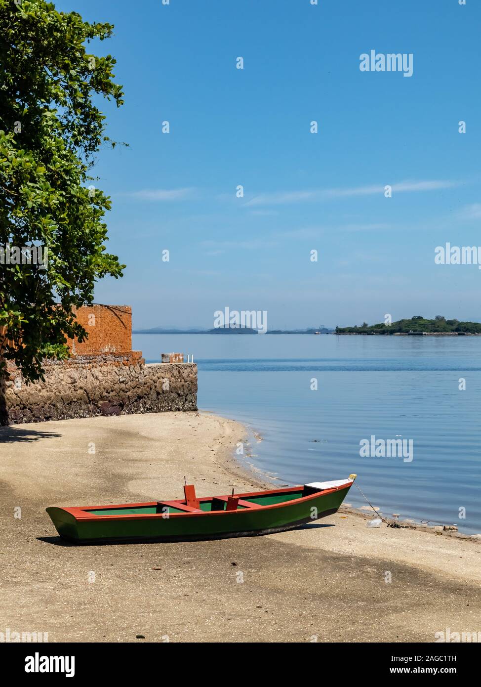 Boat in the sand at the corner of Sao Roque beach, Paqueta, Rio de ...