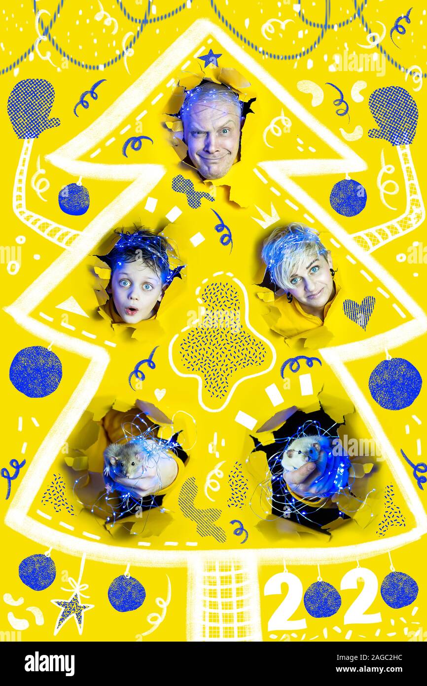 Surprised faces of people and rats in New Year's garlands peek out of ...