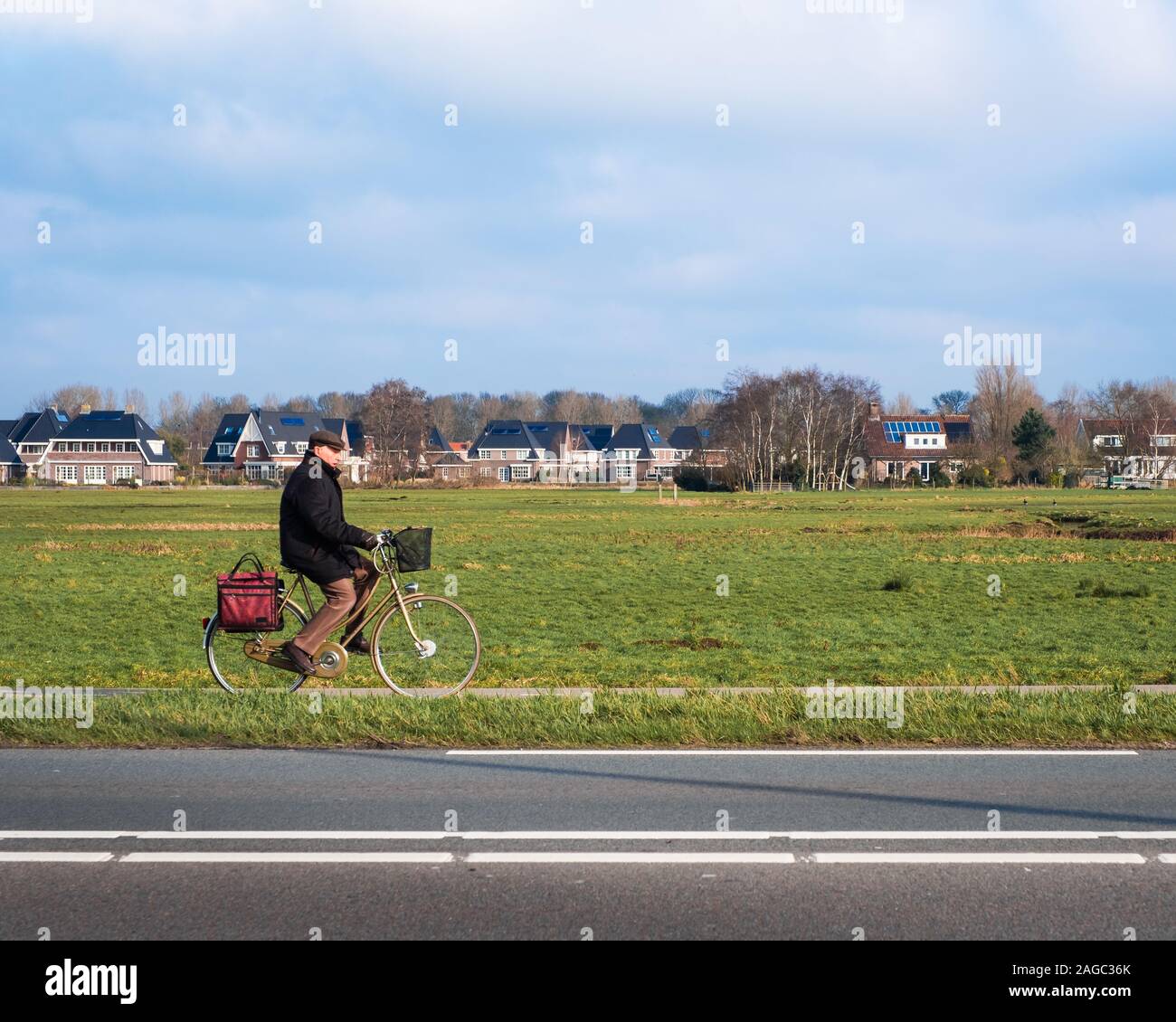 Riding a bike in countryside Stock Photo - Alamy