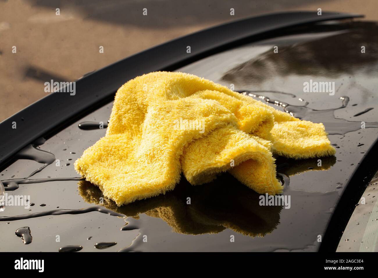 Cleaning car. Microfiber for cleaning and polishing the car Stock Photo ...