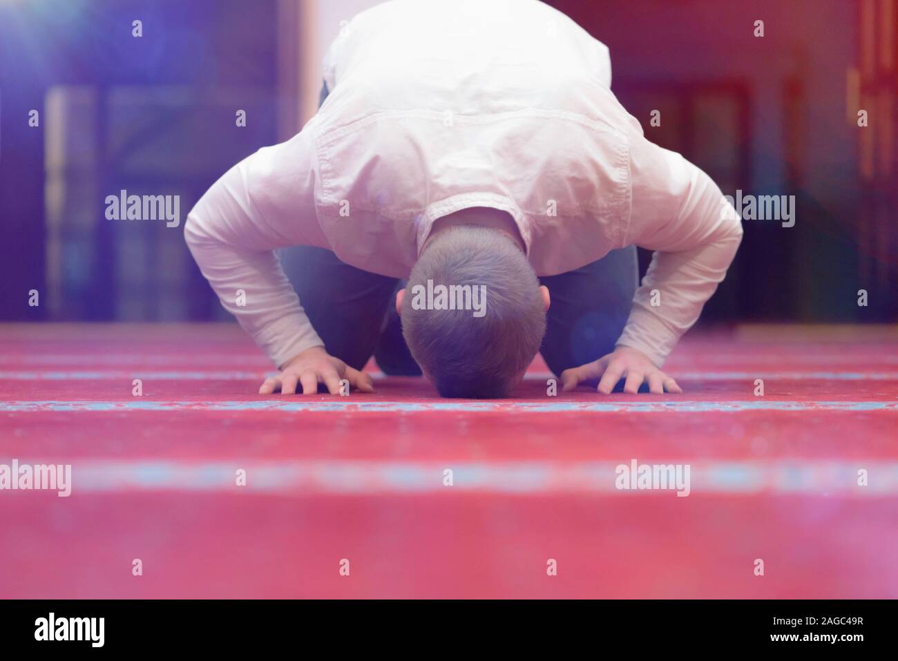 Religious muslim man praying inside the beautiful big mosque Stock ...