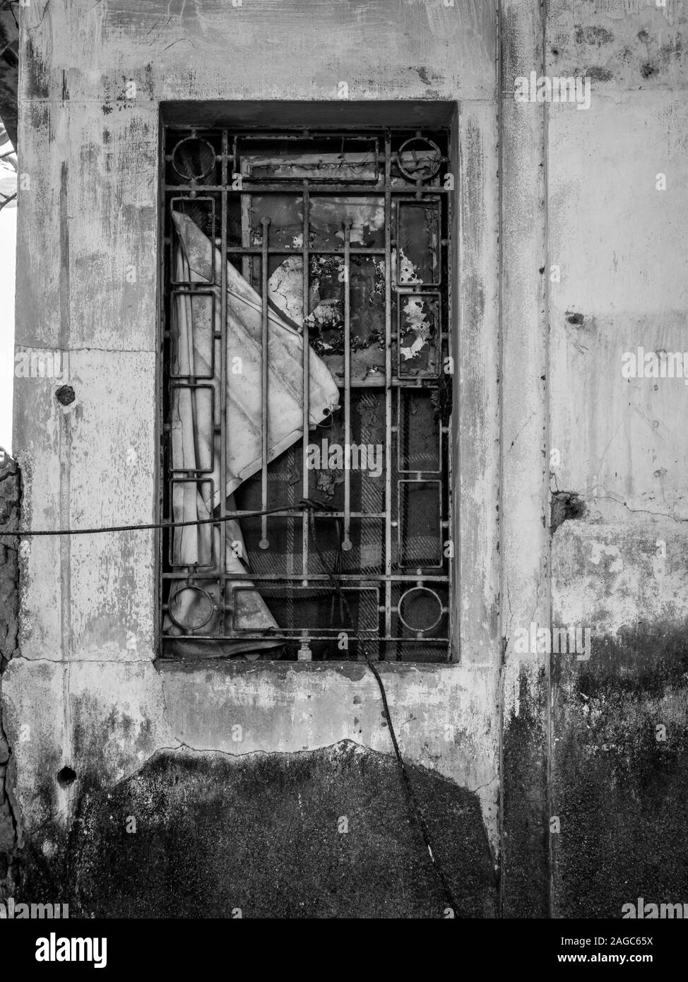 Old window with iron railing of abandoned house, Paqueta Island, Rio de ...