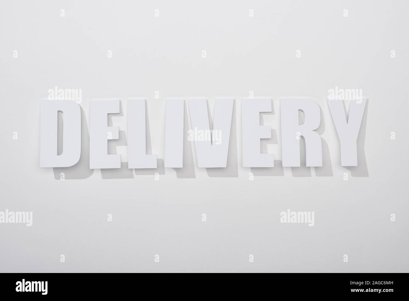 delivery text with shadow on white background with copy space Stock ...