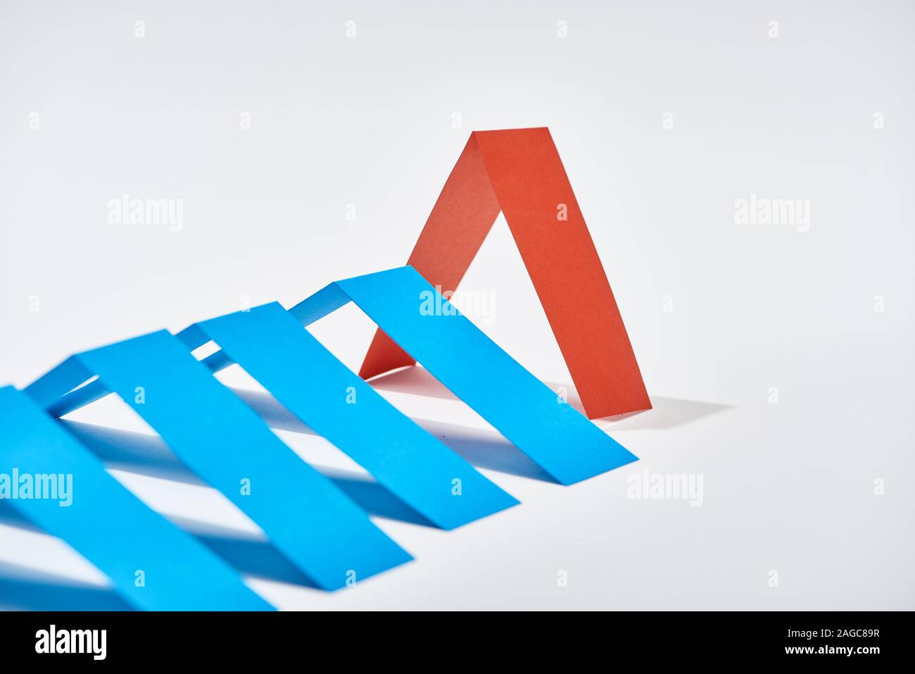 chart from red and blue paper sheets on white background Stock Photo ...