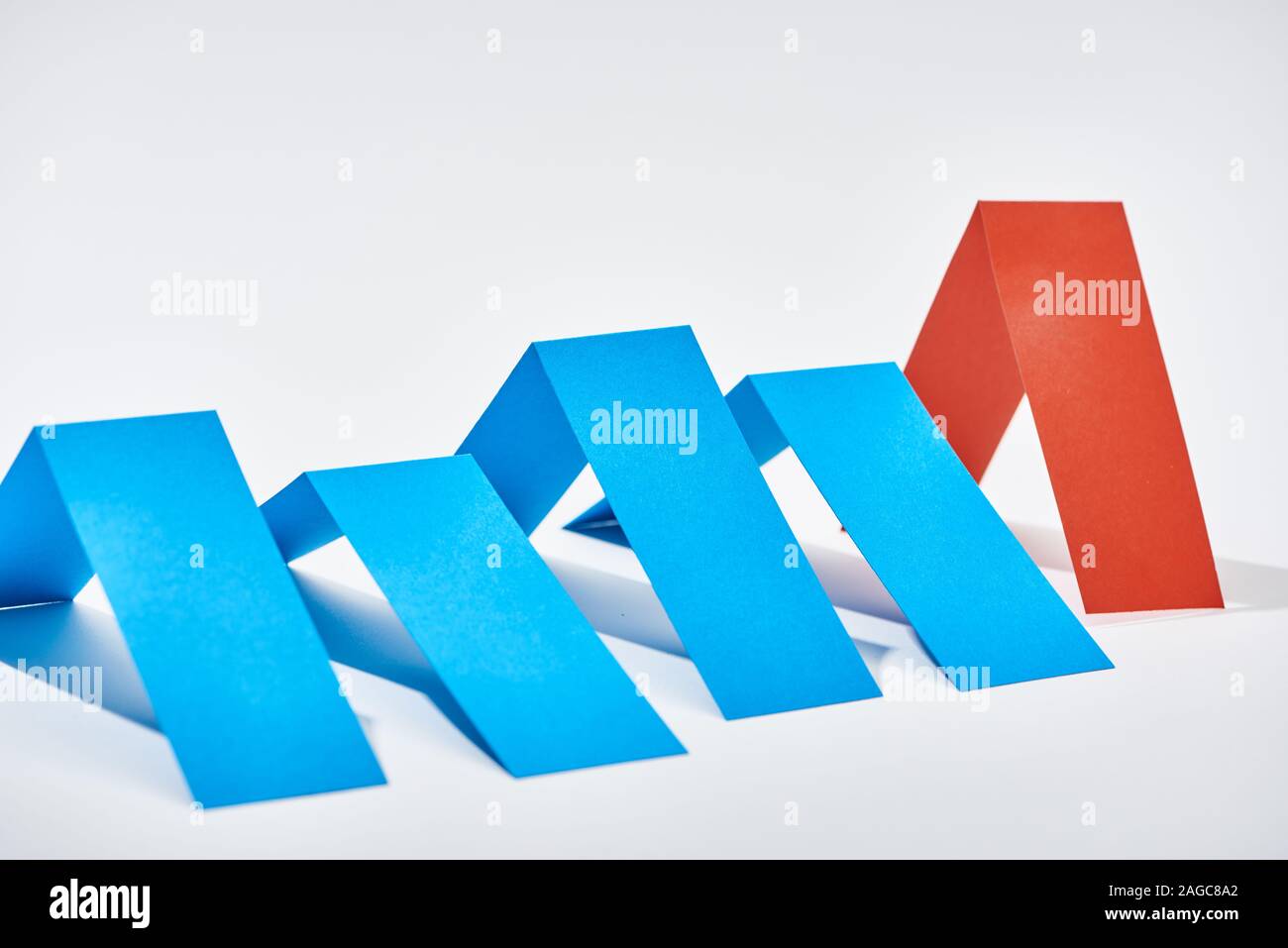 chart from blue and red paper sheets on white background Stock Photo ...