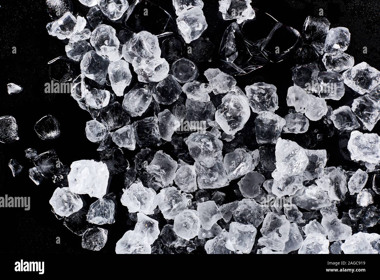 top view of frosted ice cubes isolated on black Stock Photo - Alamy