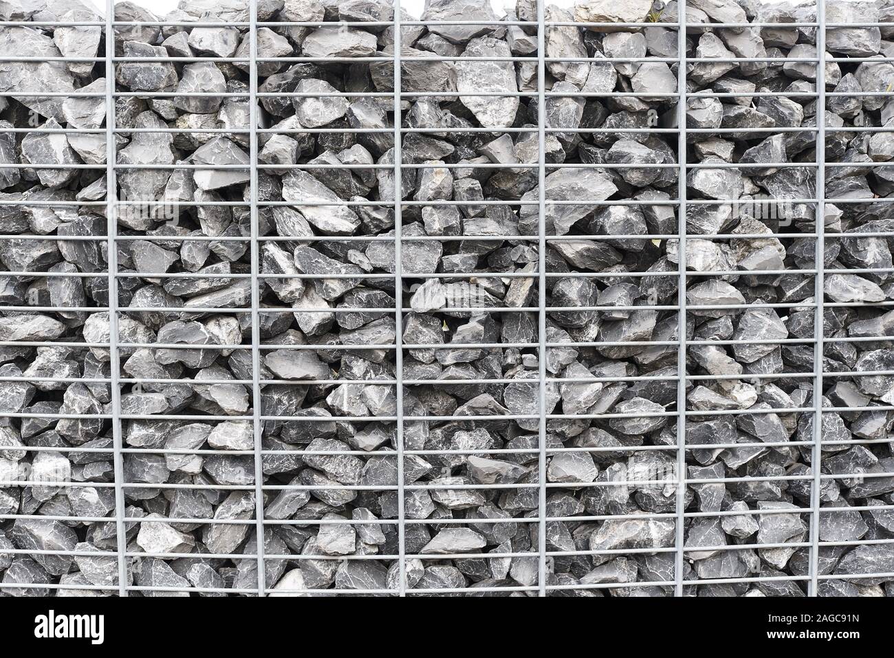 Cool background of a lot of rocks behind a metal fence - great for ...