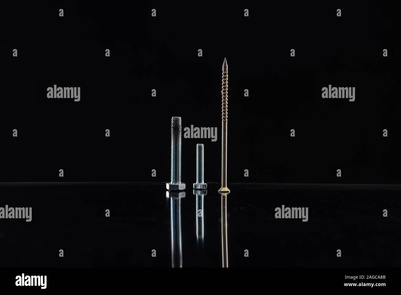 stainless steel screws isolated on black with copy space Stock Photo ...