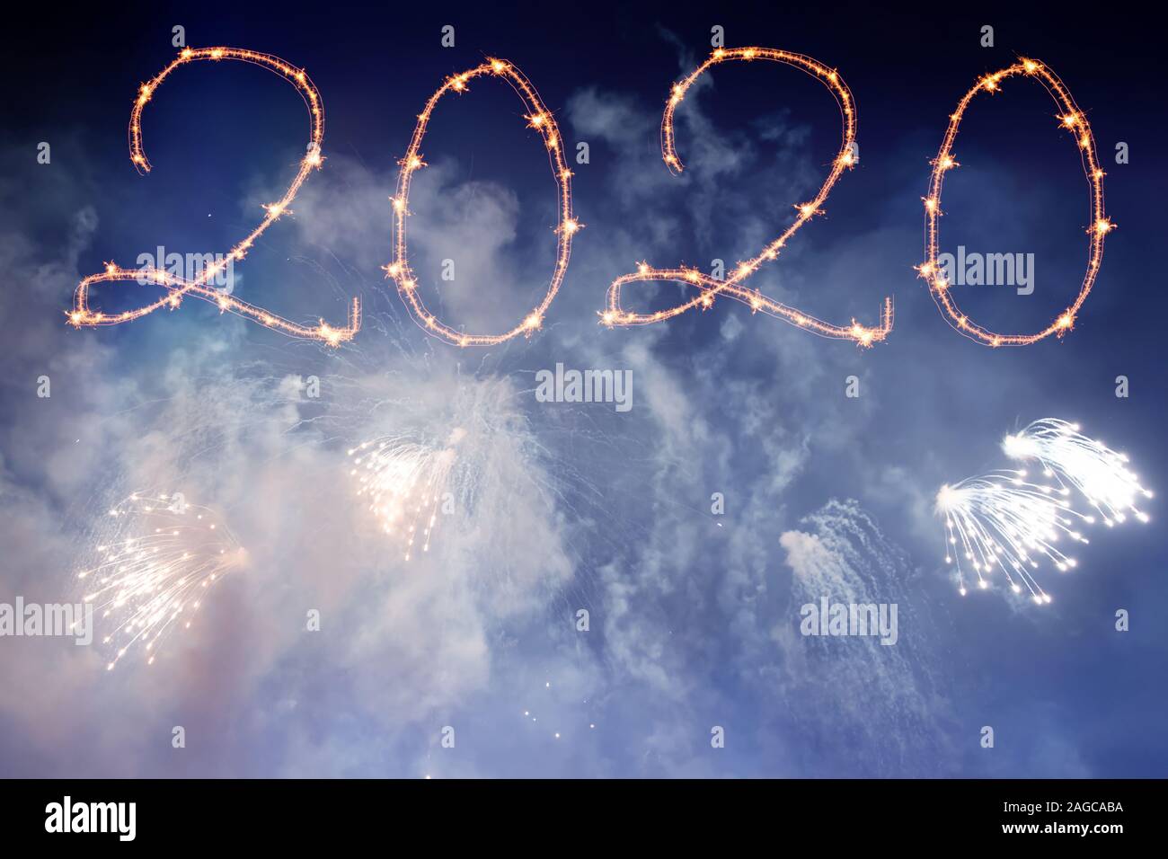 New Year 2020 celebration. Magic holiday background with fireworks ...
