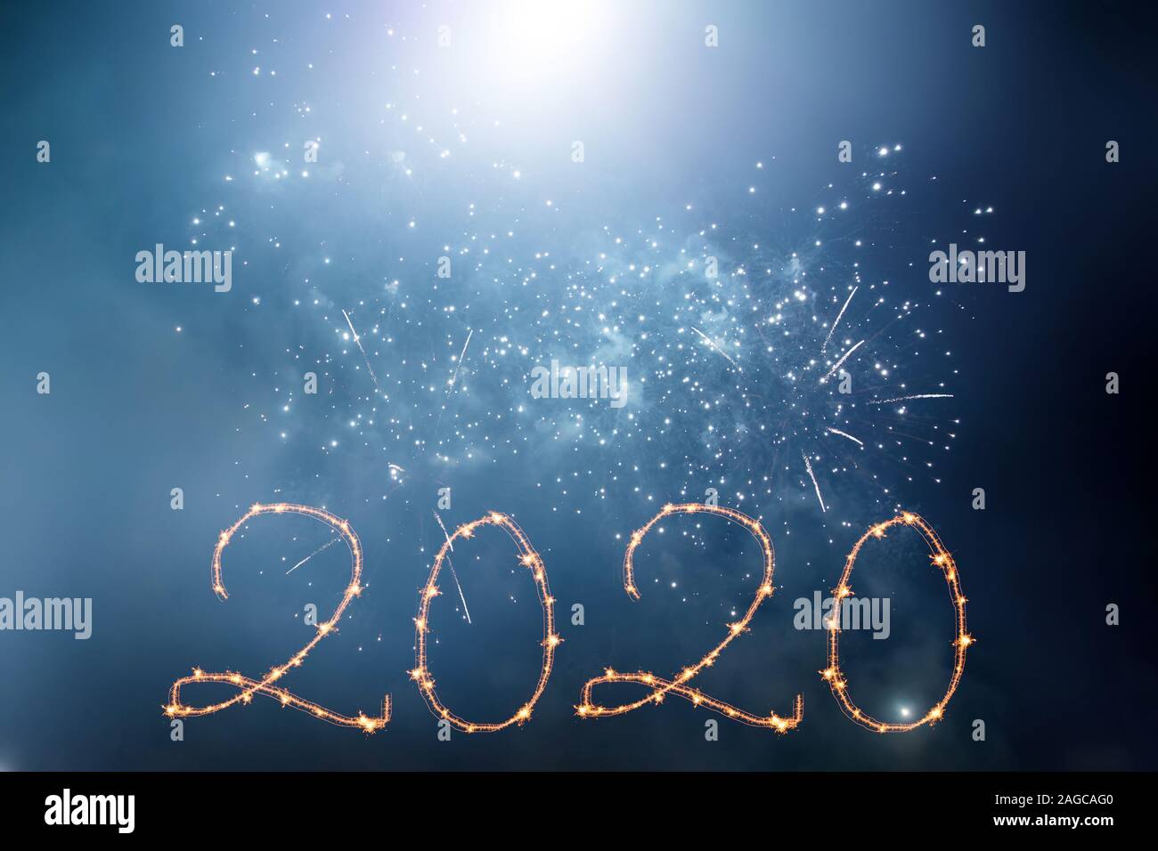 New Year 2020 celebration. Magic holiday background with fireworks ...